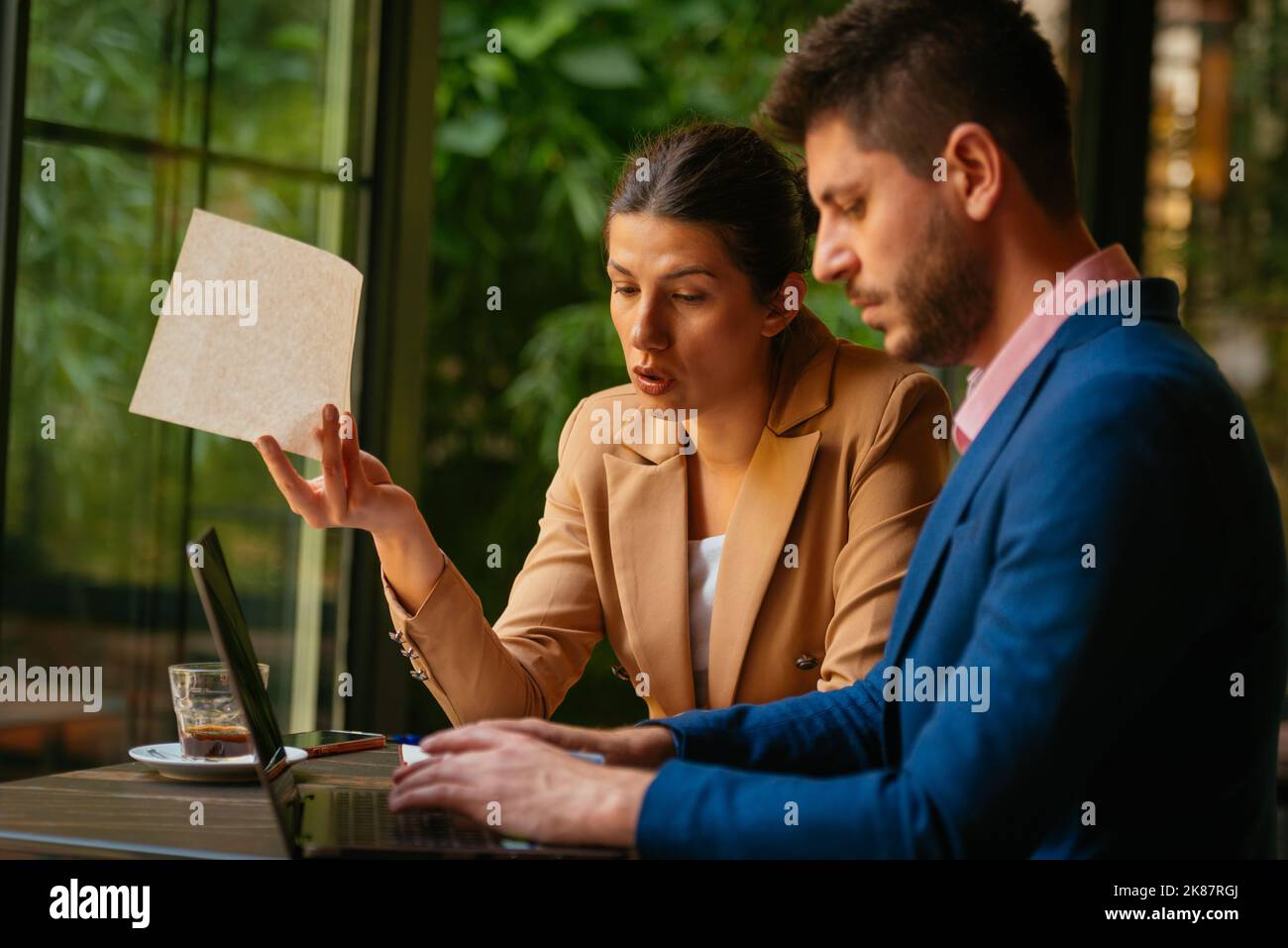 Woman sitting on partners lap hi-res stock photography and images - Alamy