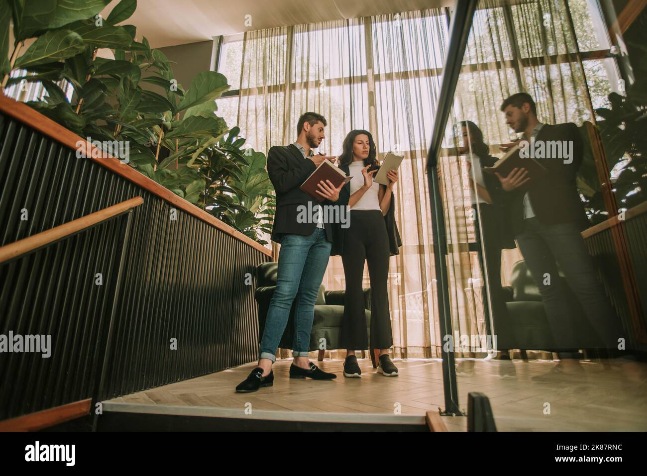 Business partners sharing ideas hi-res stock photography and images - Alamy
