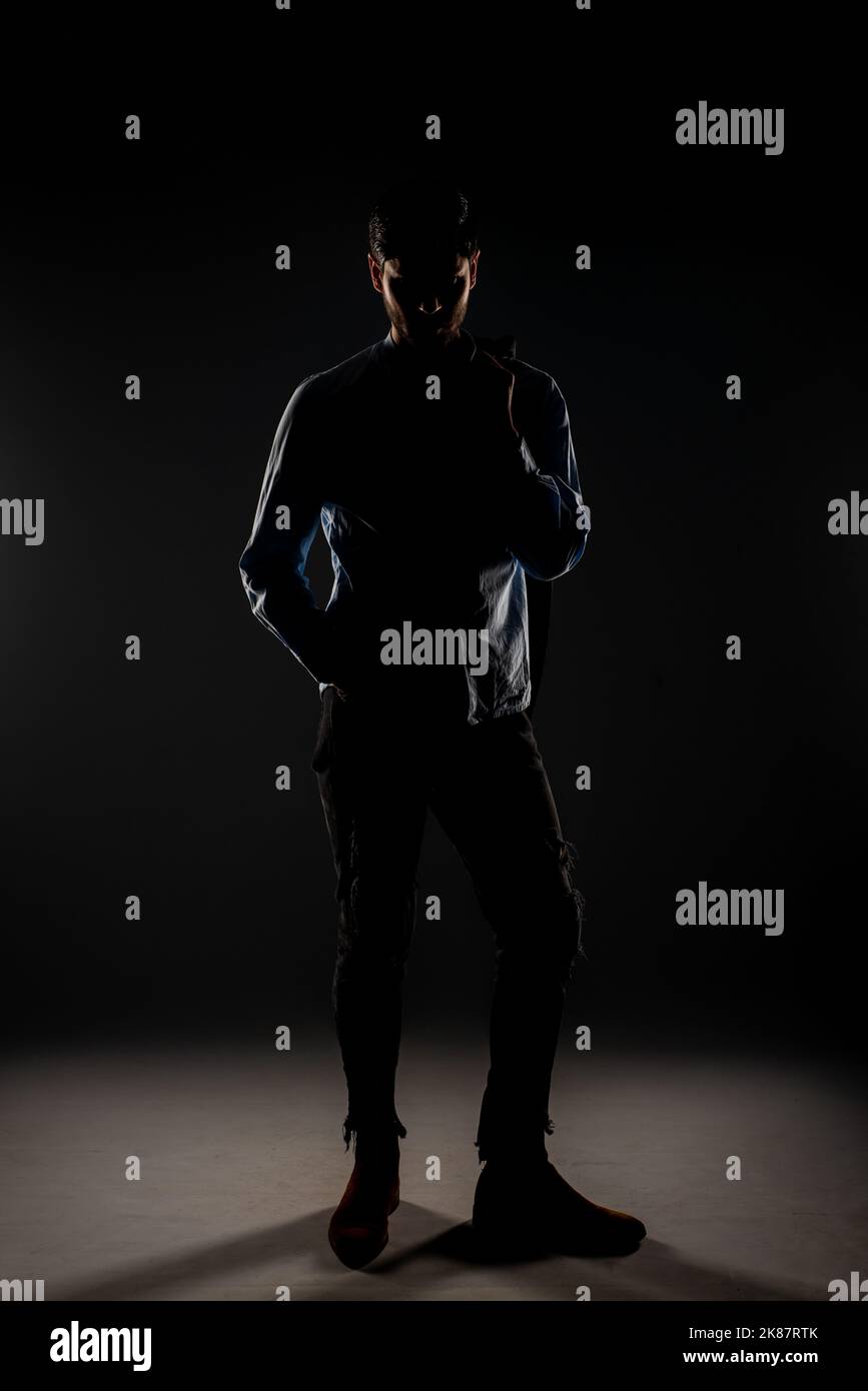Dimmed light man hi-res stock photography and images - Alamy
