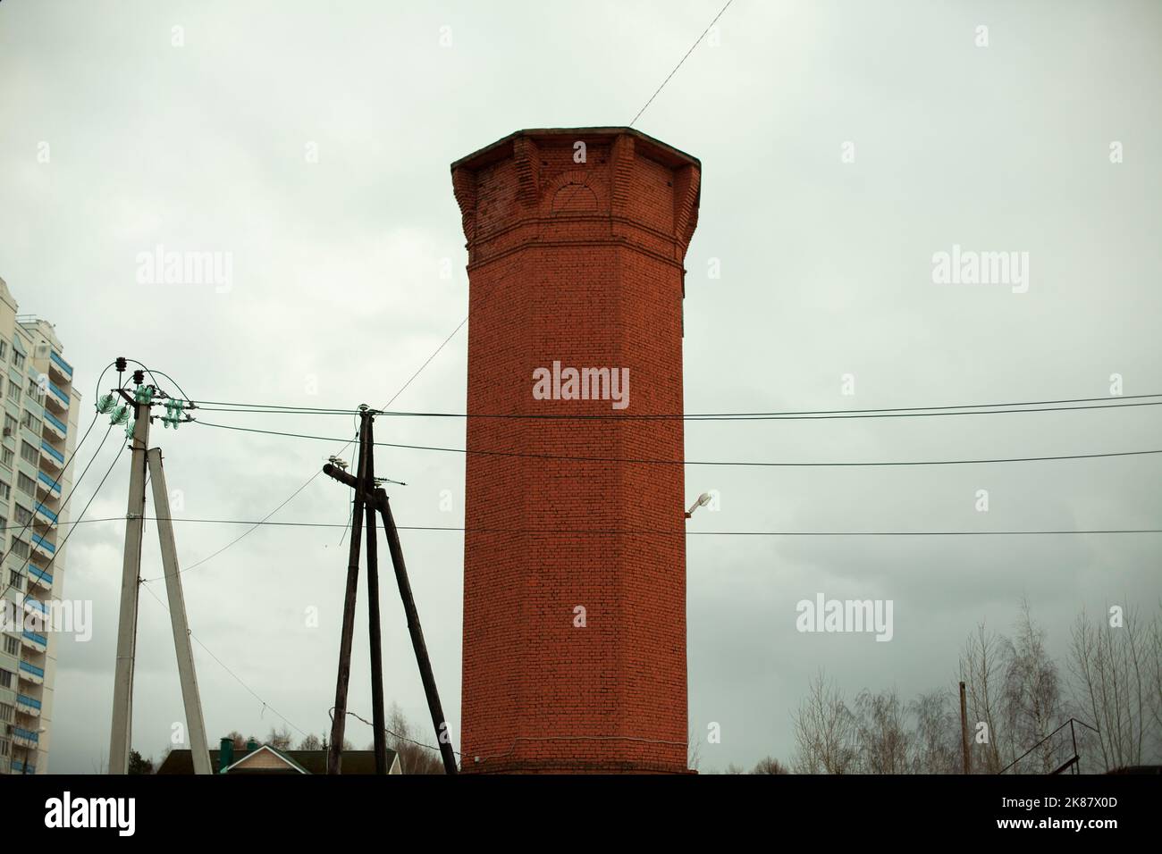 The old brick tower. Brick structure of the last century. Architecture ...