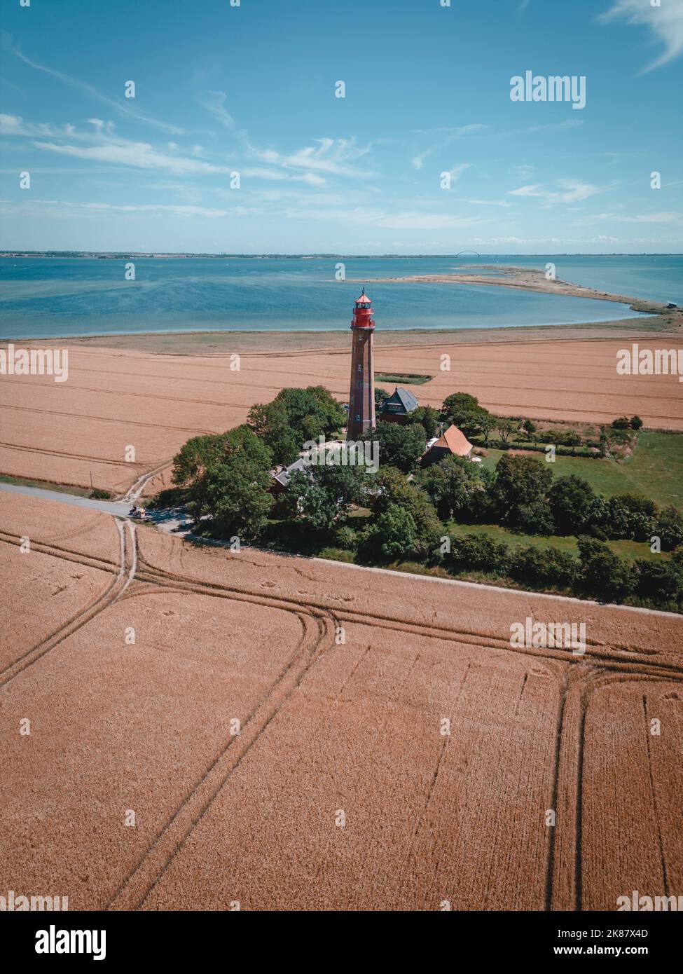 A vertical shot of the Flugge lighthouse is located in the southwest of ...