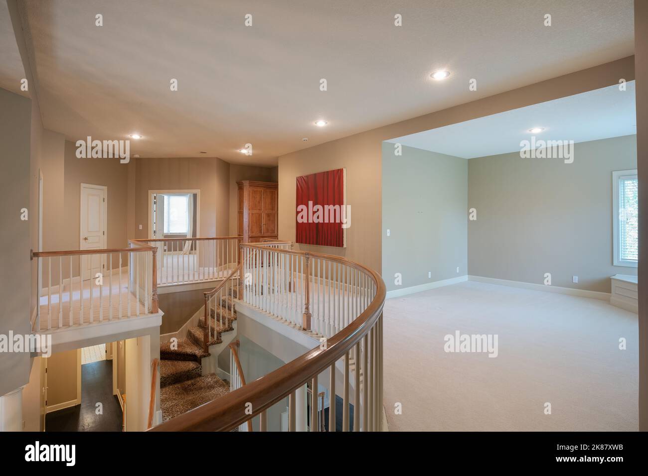 An inside view of a house with white walls and stairs Stock Photo - Alamy