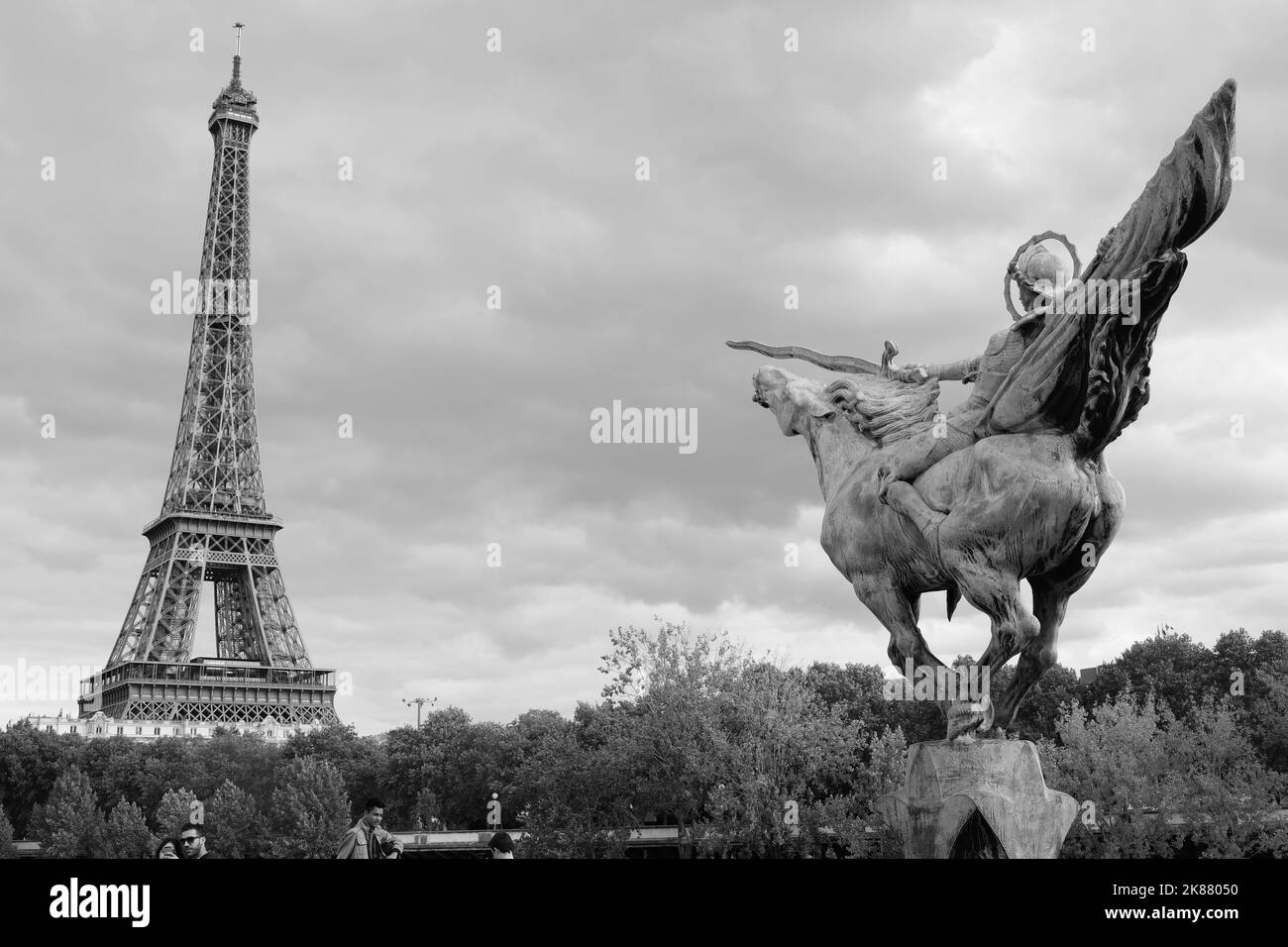 A greyscale of Statue of Bellerophon with Eiffel Tower in the ...