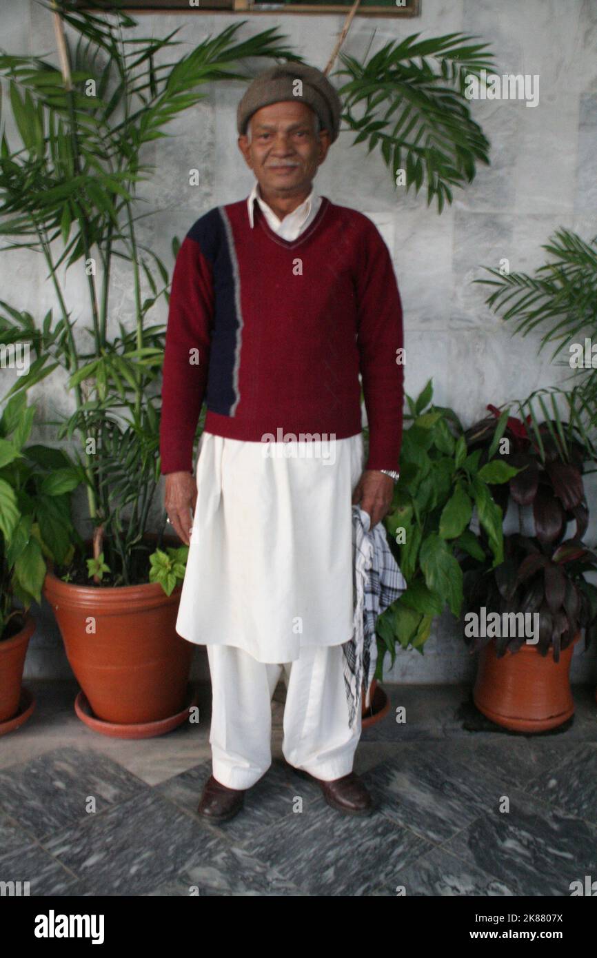 Pakistani man dressed for winter with traditional hat hi-res stock ...