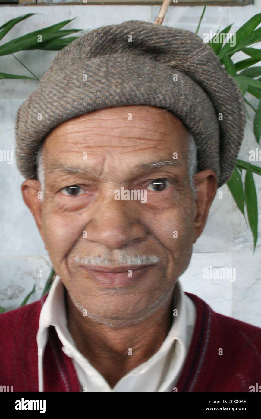 Pakistani man dressed for Winter with traditional hat, Islamabad ...