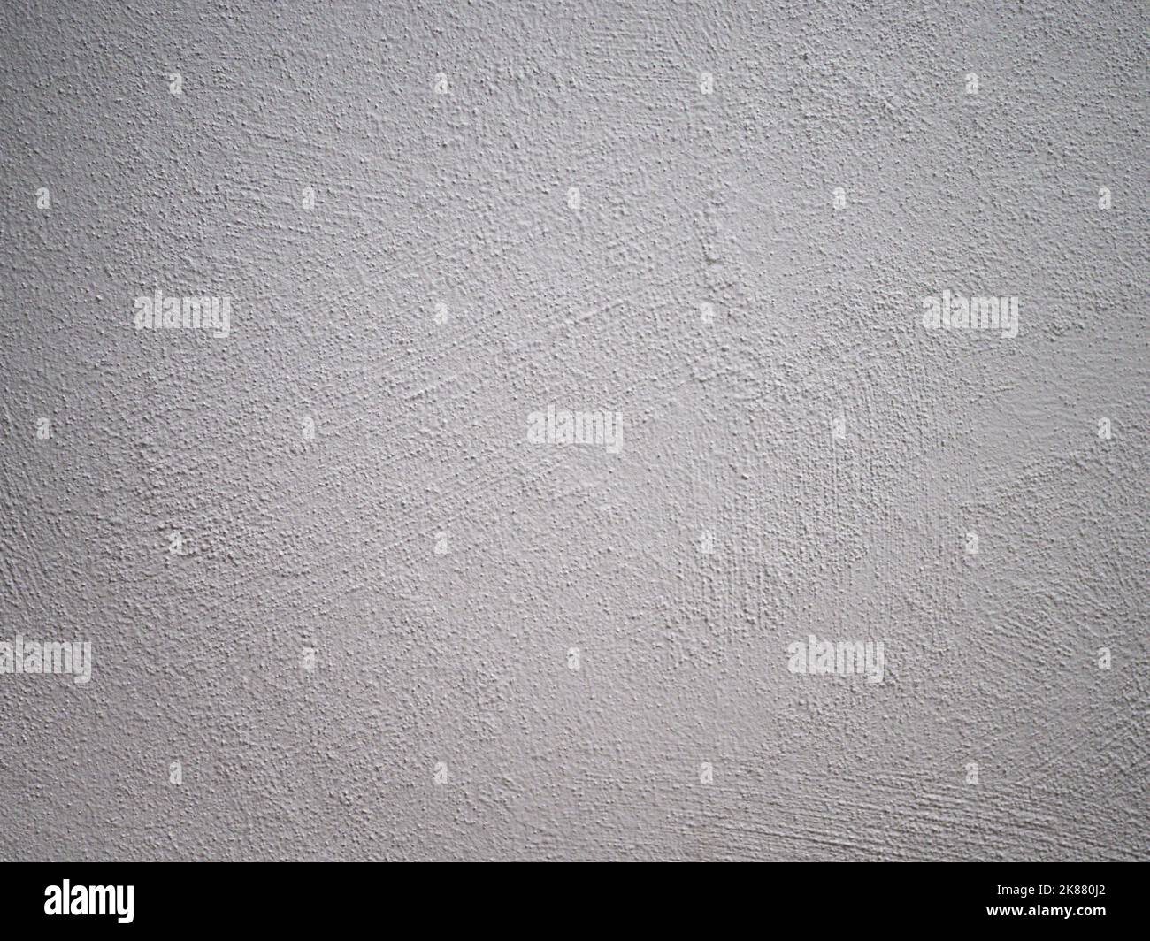 A grayish closeup of exterior granular wall texture perfect for a ...