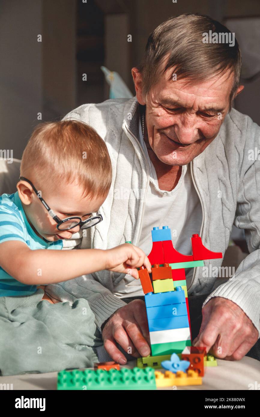 Boy grandfather blocks hi-res stock photography and images - Alamy