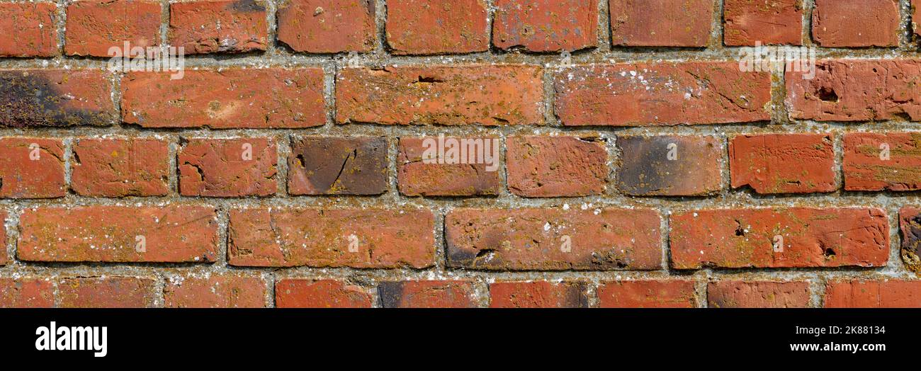 Wide weathered red brick wall background Stock Photo - Alamy