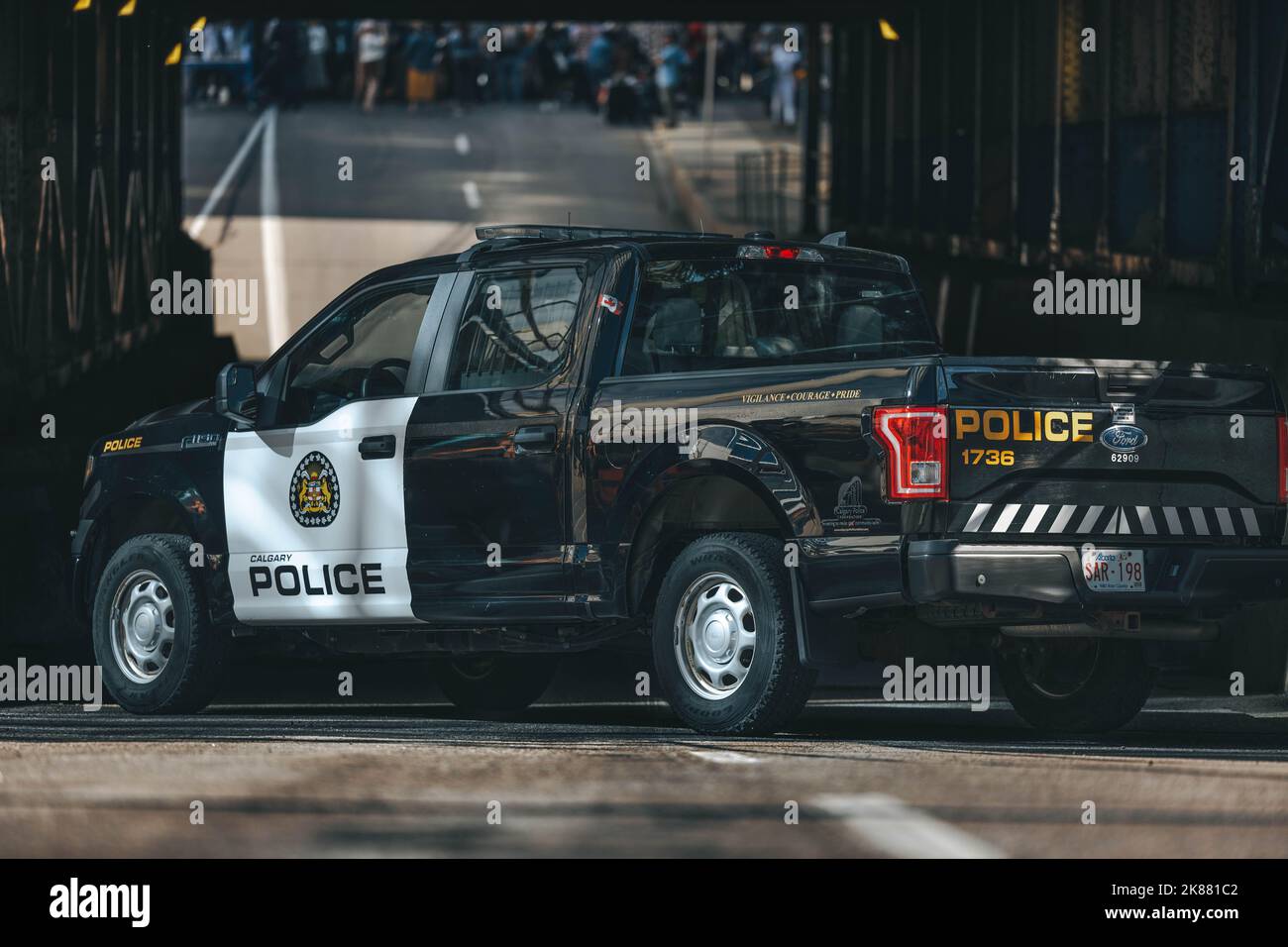 A side closeup of marked Calgary Police Ford F150 blocking traffic at ...
