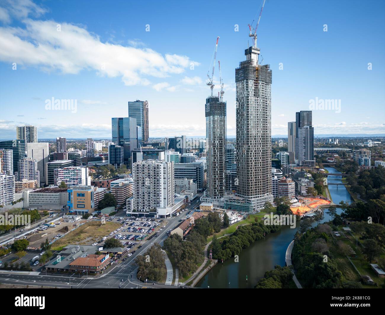 A high-angle of Parramatta cityscape in Western Sydney, with a lake ...