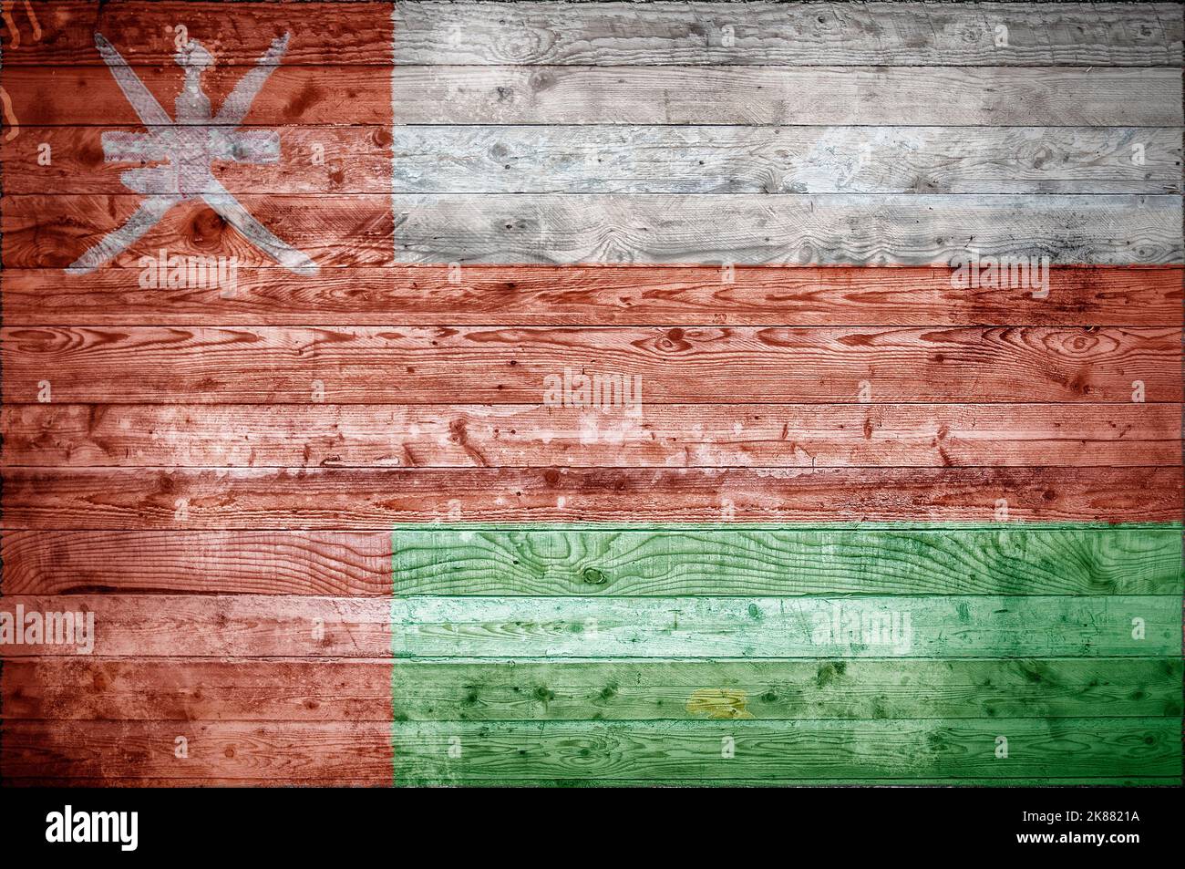 A vignetted background image of the flag of Oman onto wooden boards of ...