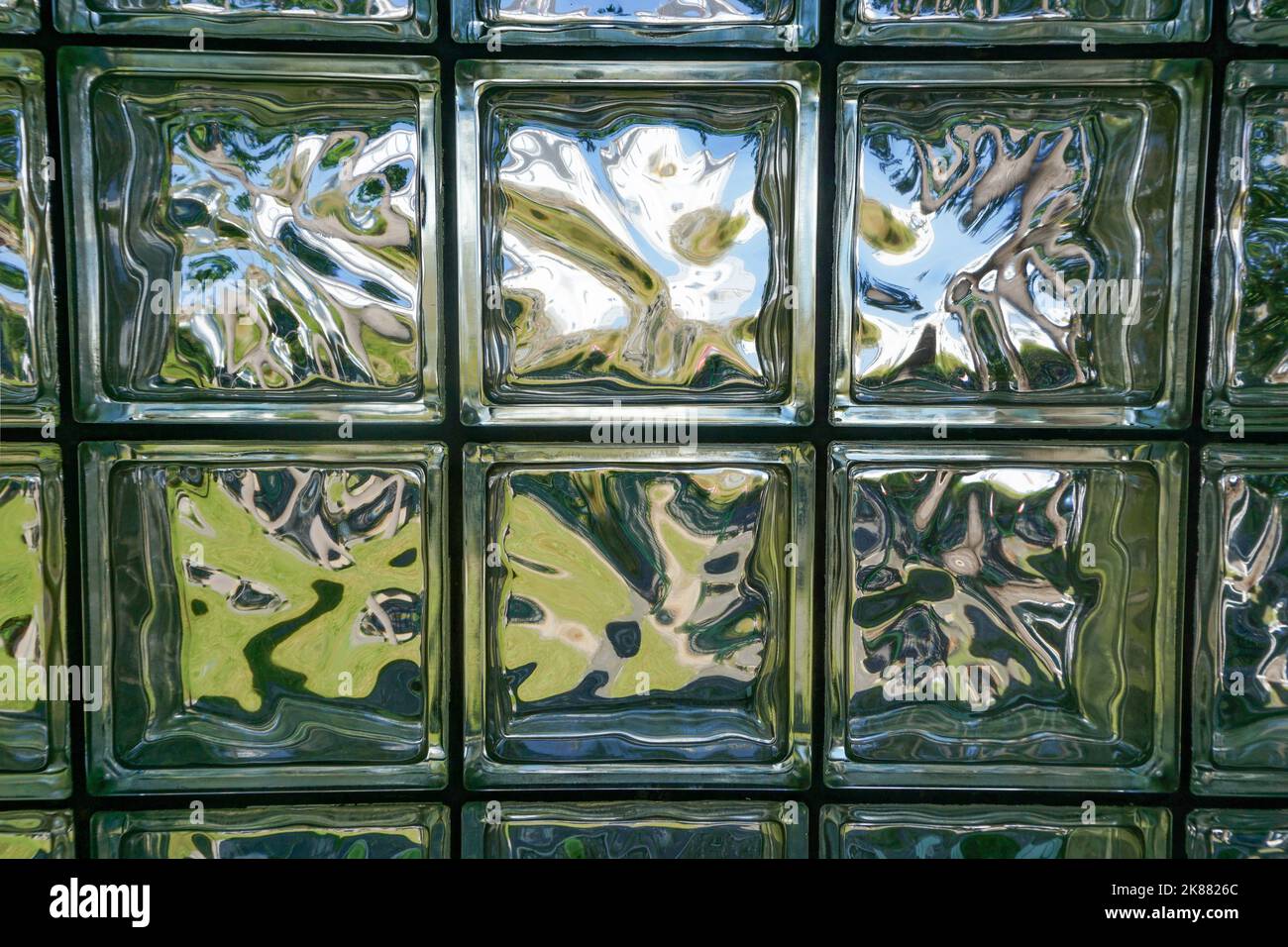 Abstract patterns in a wall of glass blocks Stock Photo - Alamy