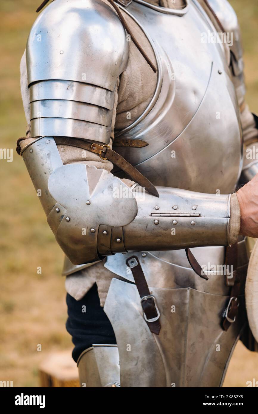 Close-up of a medieval knight in armor preparing for battle Stock Photo ...