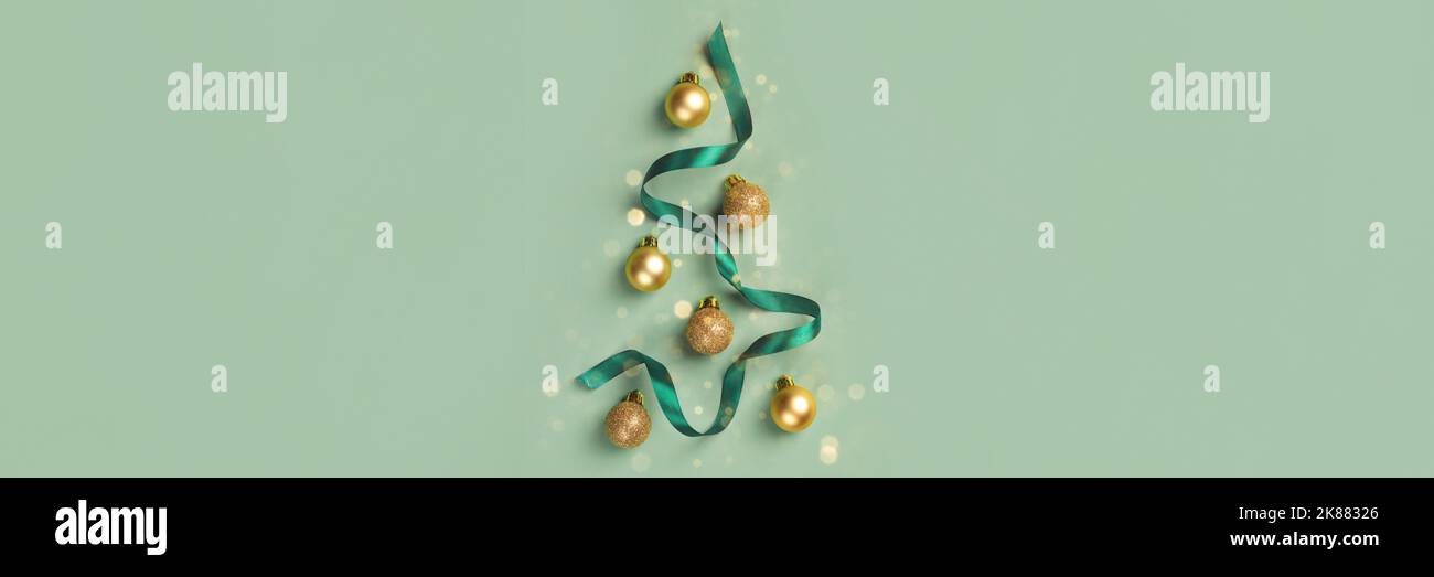 Christmas banner with golden glitter balls decorations and satin ribbon ...