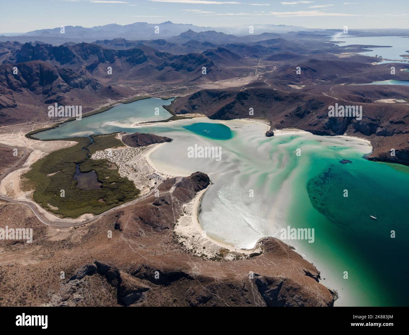 An aerial of Balandra bay surrounded by grey sand dunes Stock Photo - Alamy