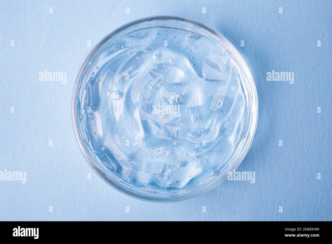 Top view of cosmetics gel with bubbly structure in the petri dish ...