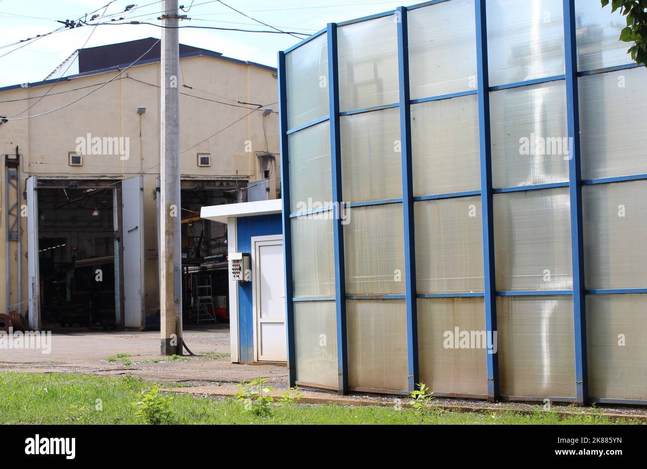Warehouses and a half-transparent wall in an isolated place Stock Photo ...