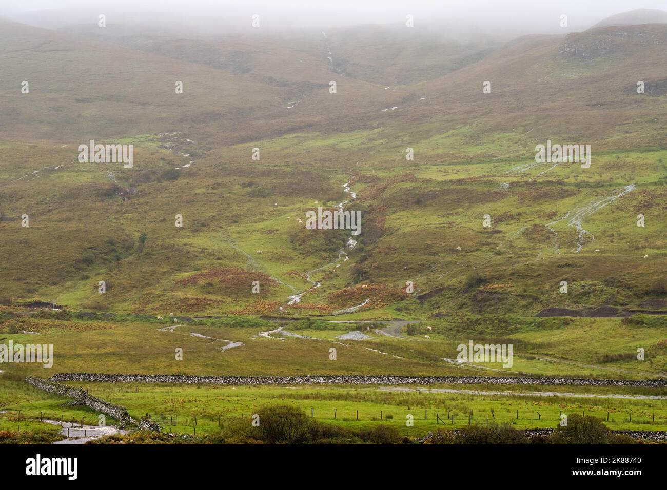 A view of a mountain stream after heavy rain that's flooded farmers ...
