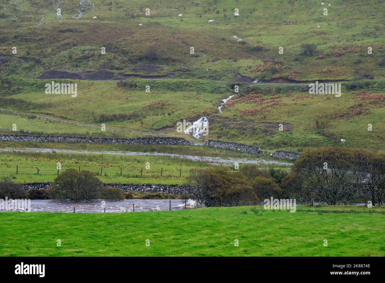 A view of a mountain stream after heavy rain that's flooded farmers ...