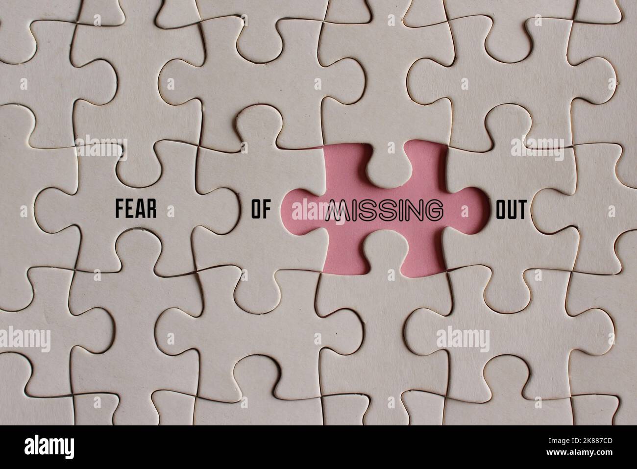 Top view image of puzzle with text FEAR OF MISSING OUT or FOMO Stock ...