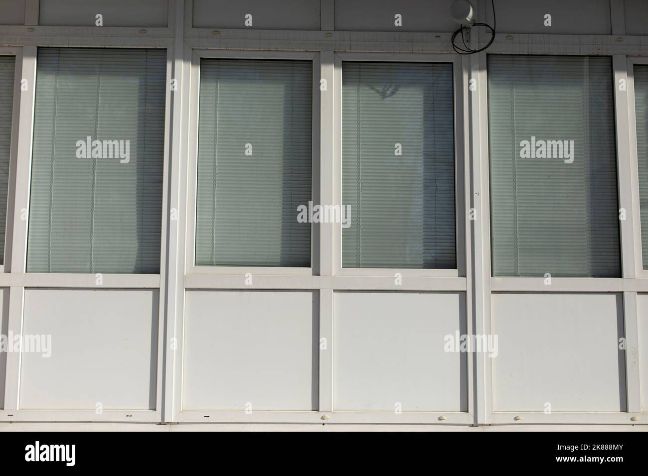 Plastic window. White window frames in building. Architecture details ...