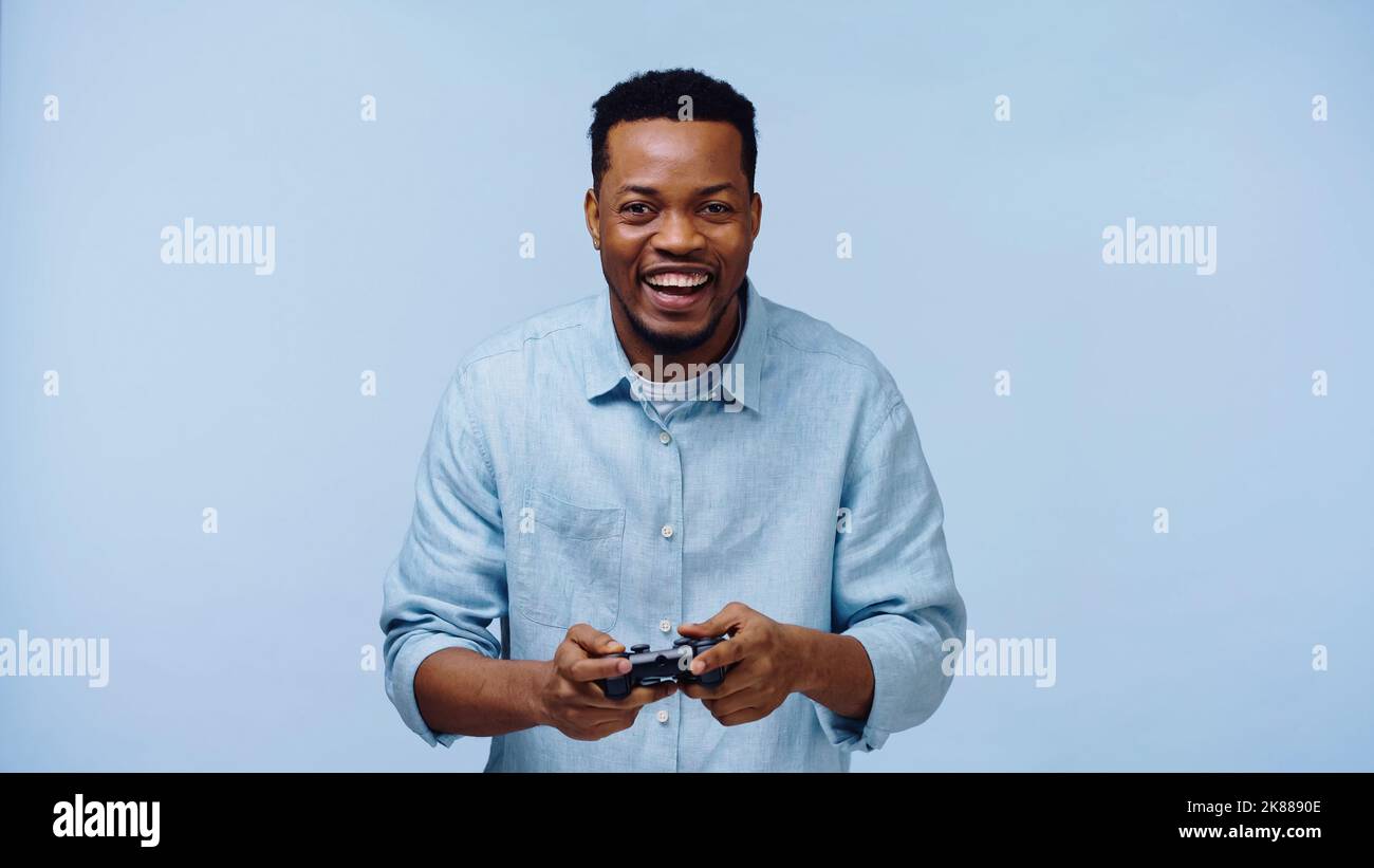 KYIV, UKRAINE - NOVEMBER 22, 2019: cheerful african american man ...