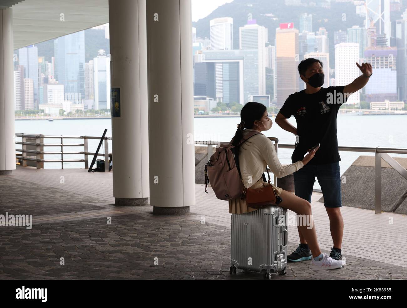 People enjoy a day out at Tsim Sha Tsui on the national day public ...
