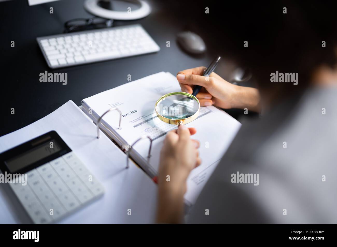 Auditor Using Magnifying Glass For Audit And Fraud Investigation Stock ...