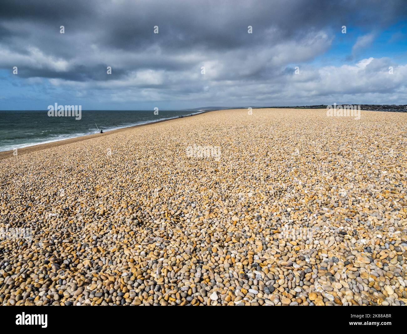 Storm clouds over Chesil Beach in Dorset Stock Photo - Alamy