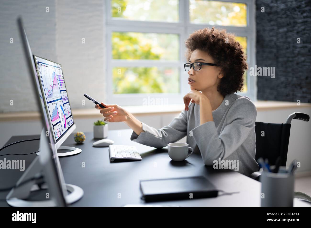 KPI Business Analytics Data Dashboard. Analyst Using Computer Stock ...