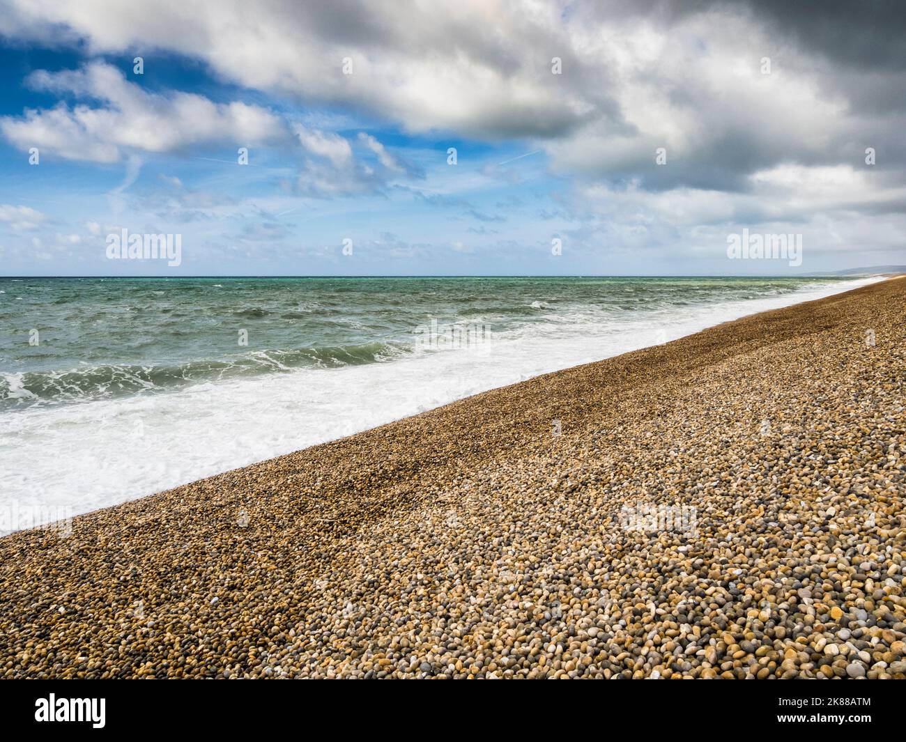 Storm clouds over Chesil Beach in Dorset Stock Photo - Alamy