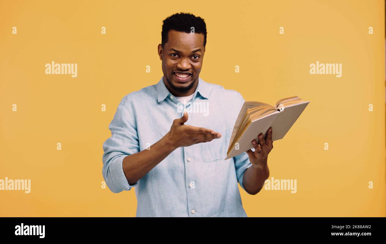 Bearded man pointing book hi-res stock photography and images - Alamy