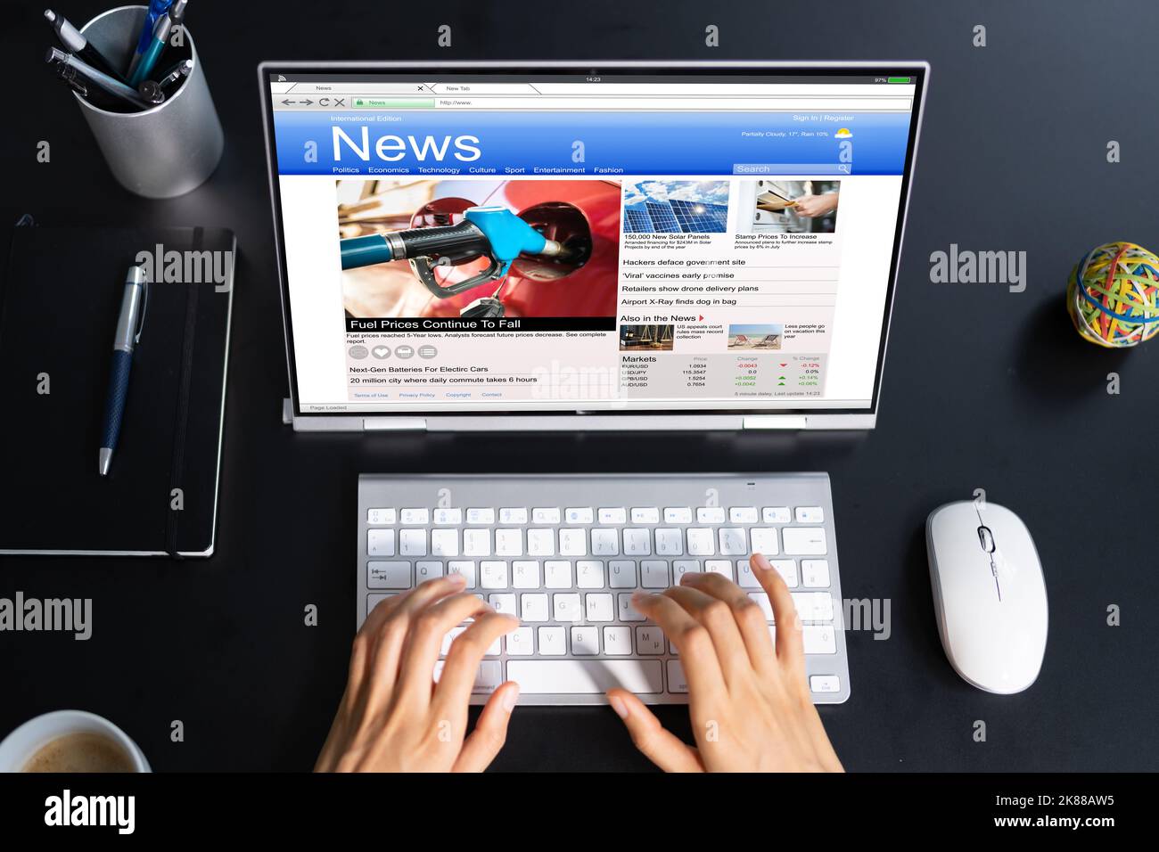 African American Reading Online News Media On Laptop Stock Photo - Alamy
