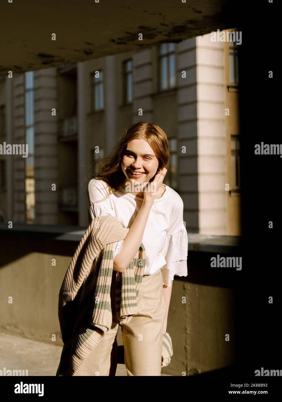 The girl catches the rays of the sun Stock Photo - Alamy