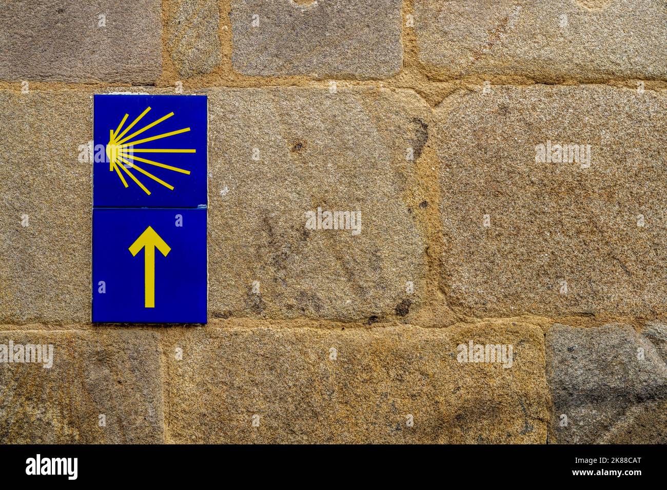 Camino de Santiago sign on stone facade in the city of Pontevedra, in ...