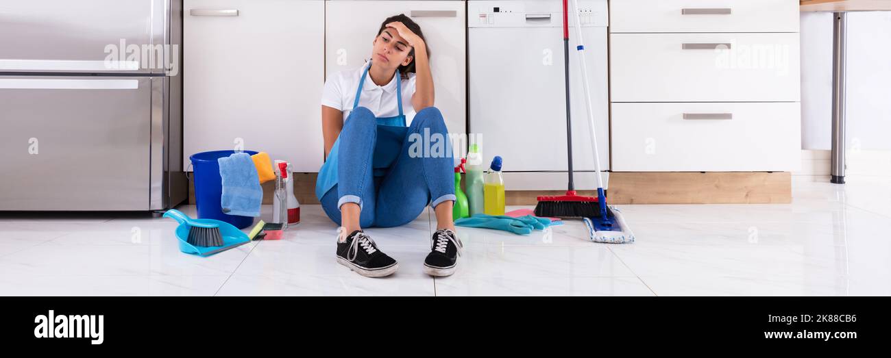 Sad Woman Cleaning Kitchen. Exhausted Housewife. Bored Maid Service ...