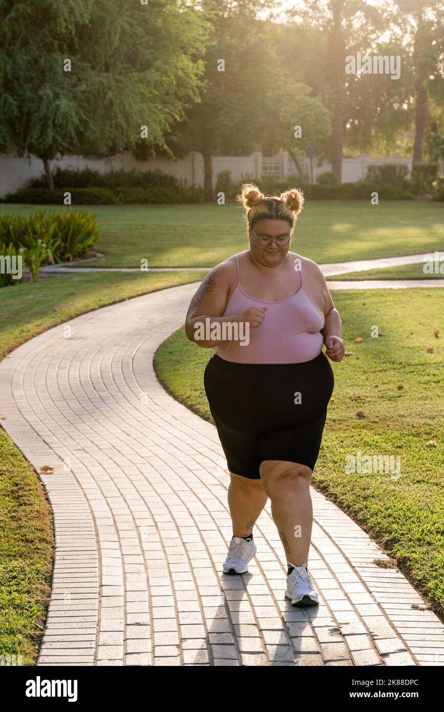 Overweight people walking hi-res stock photography and images - Alamy