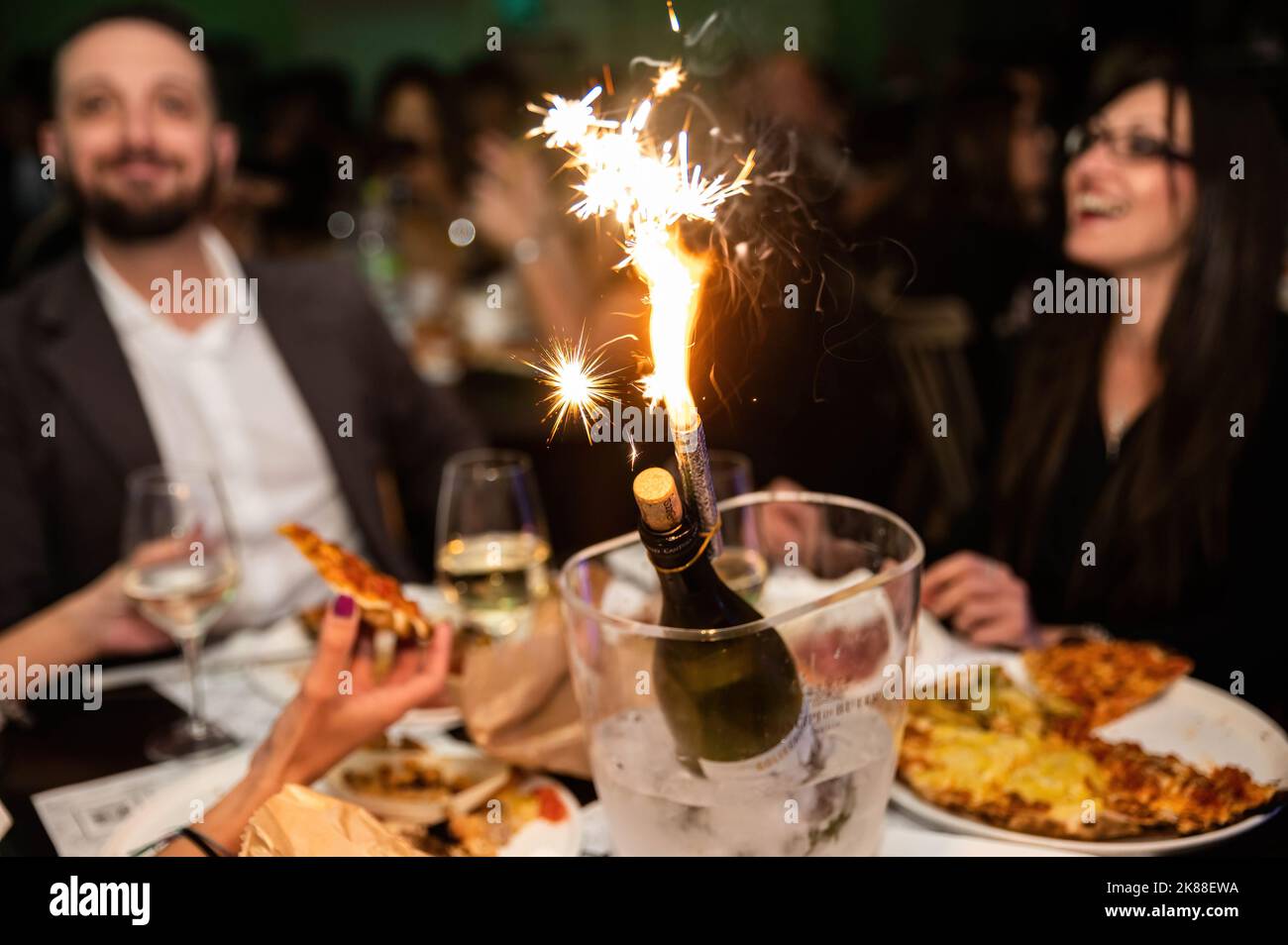 party during a dinner in a place with candle that sparkle Stock Photo ...