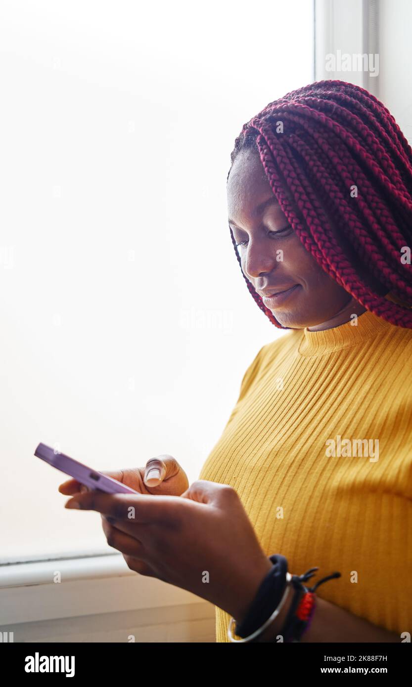 Photo serious african woman hi-res stock photography and images - Alamy