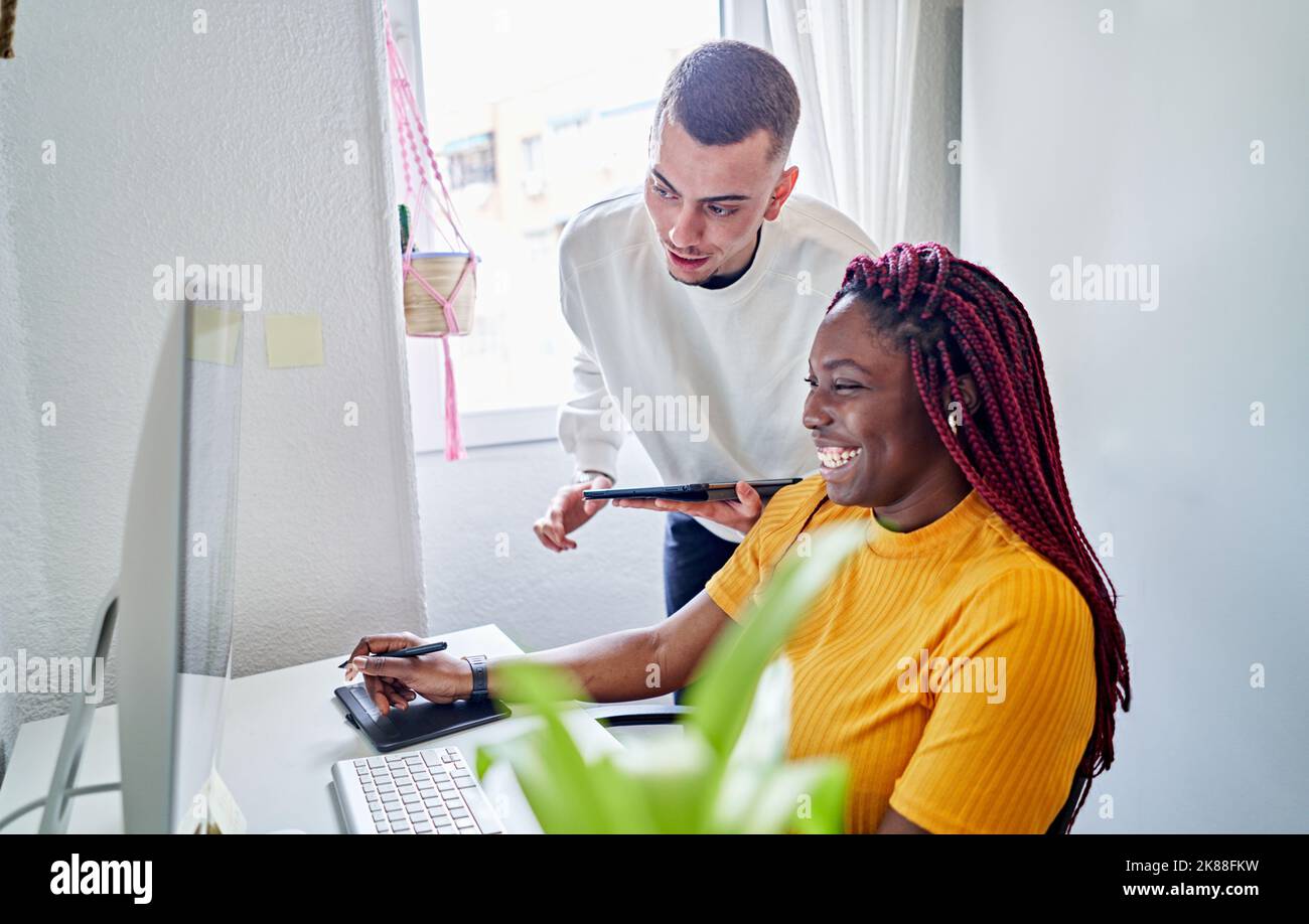 Busy working together hi-res stock photography and images - Alamy