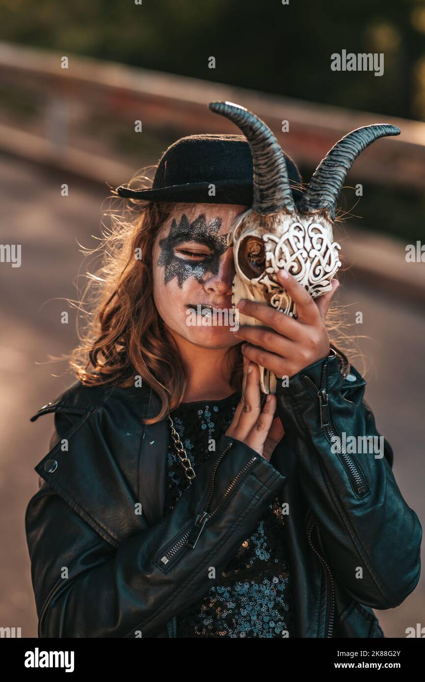 Teenage girl in hard rock costumes celebrate Halloween party Stock ...