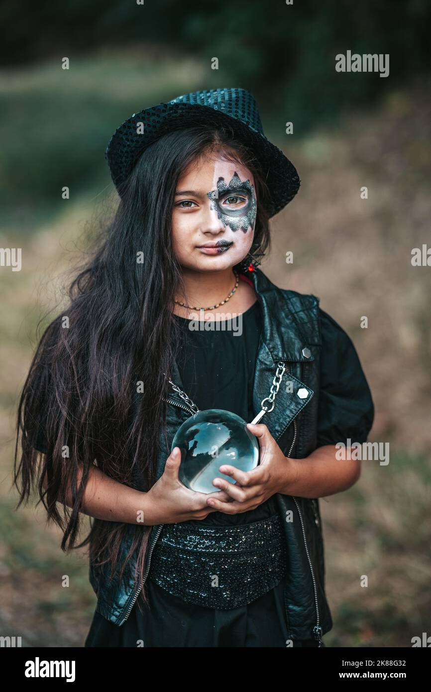 Teenage girl in hard rock costumes celebrate Halloween party Stock ...