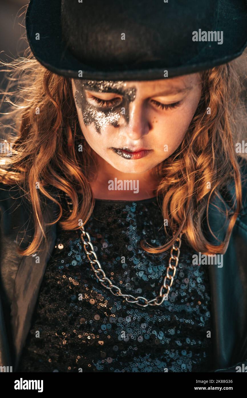 Teenage girl in hard rock costumes celebrate Halloween party Stock ...