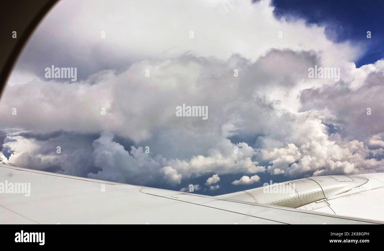 Shot of a beautiful clouds from plane window Stock Photo - Alamy