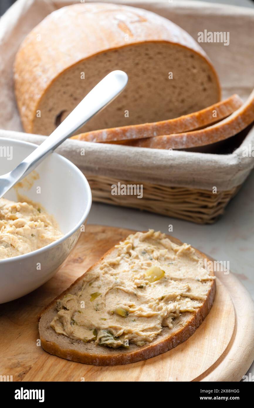 cracklings spread with pickled cucumber on slice of bread Stock Photo ...