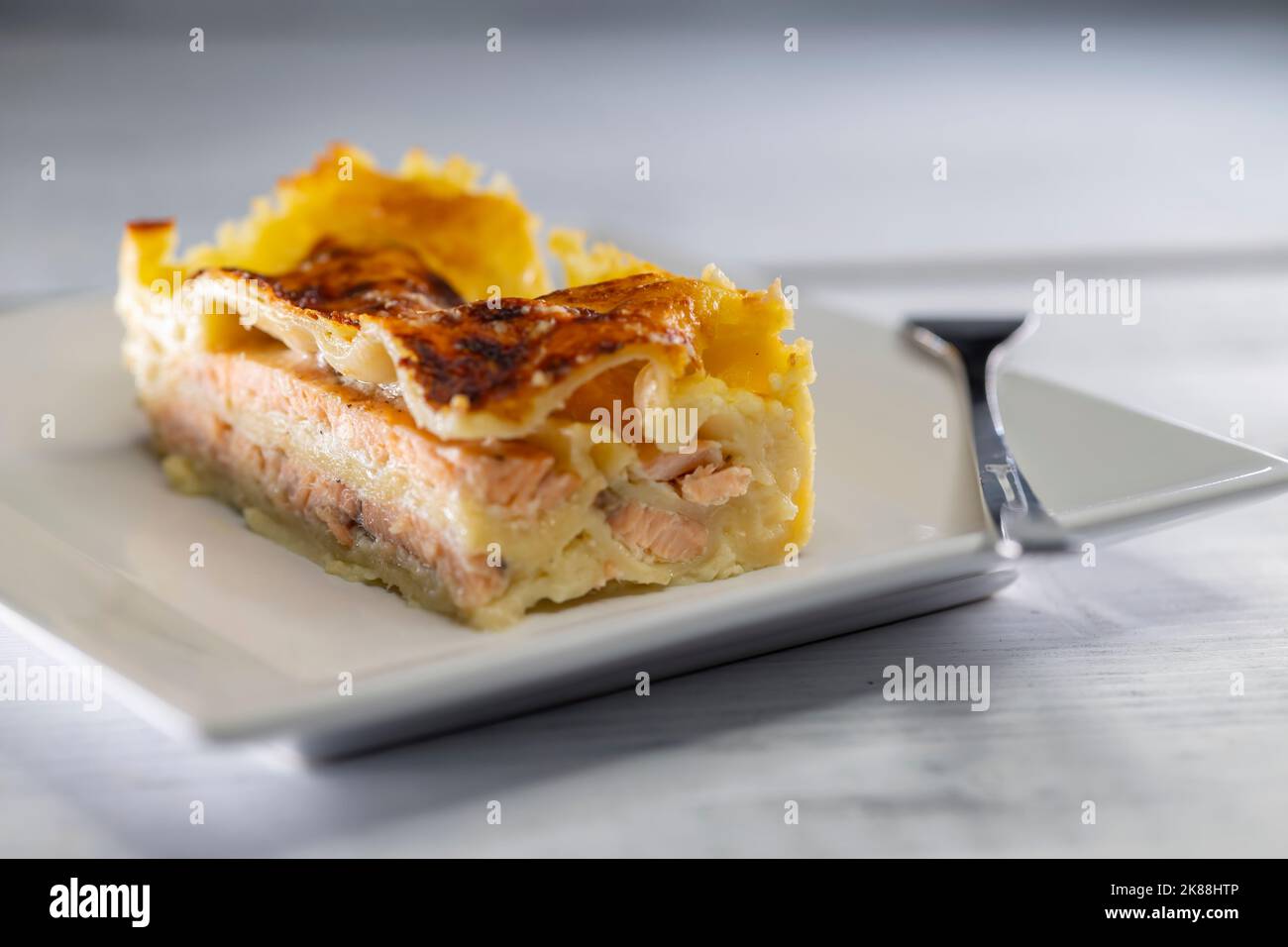 lasagne with salmon, bechamel and parmesan cheese Stock Photo - Alamy