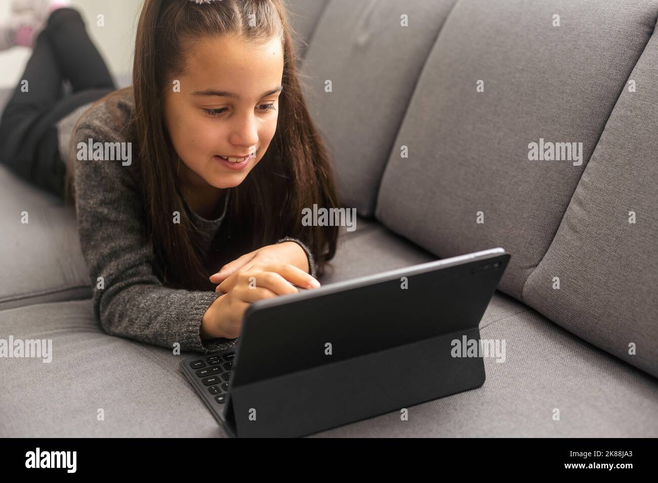 Happy smiling arab indian girl student watching learning online video ...