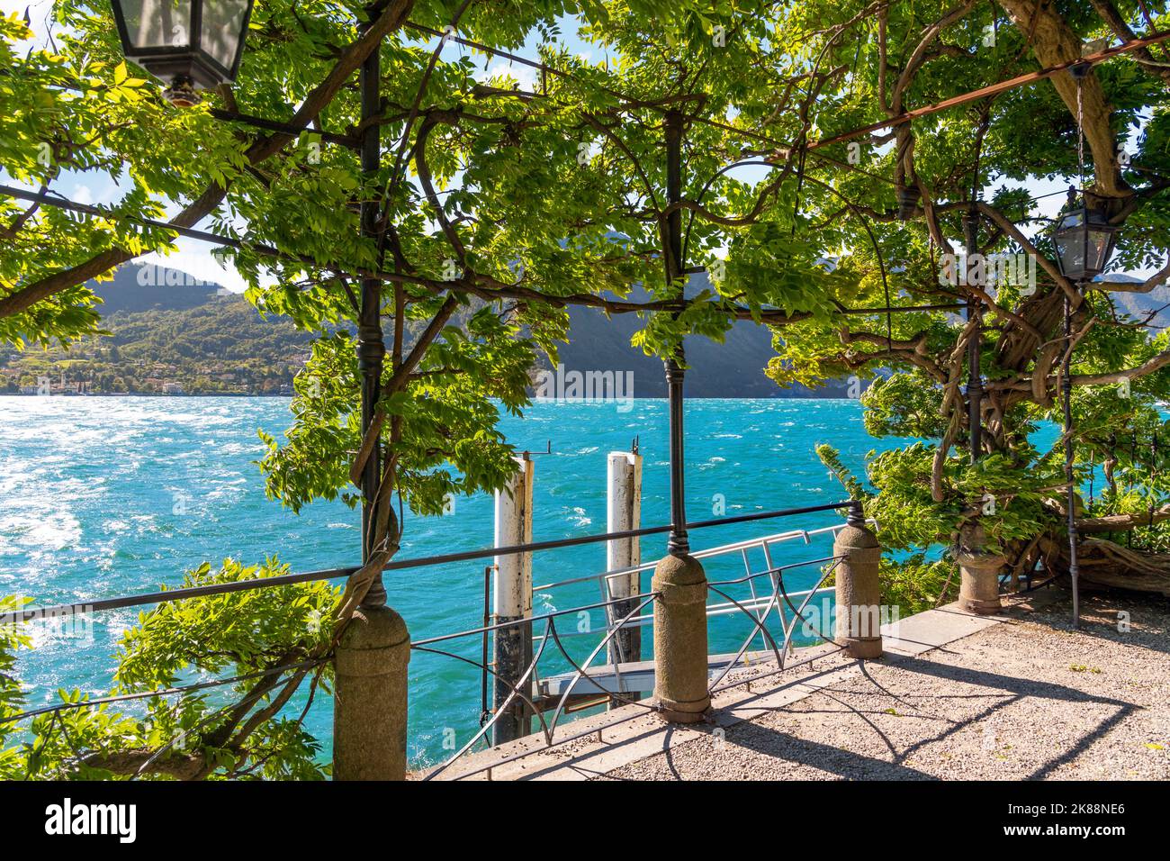 An ivy and plant covered terrace along the coastal promenade of Lake ...