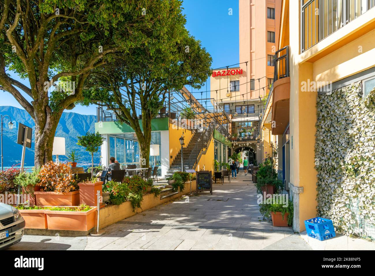 A waterfront cafe and covered promenade of shops along the shores of ...