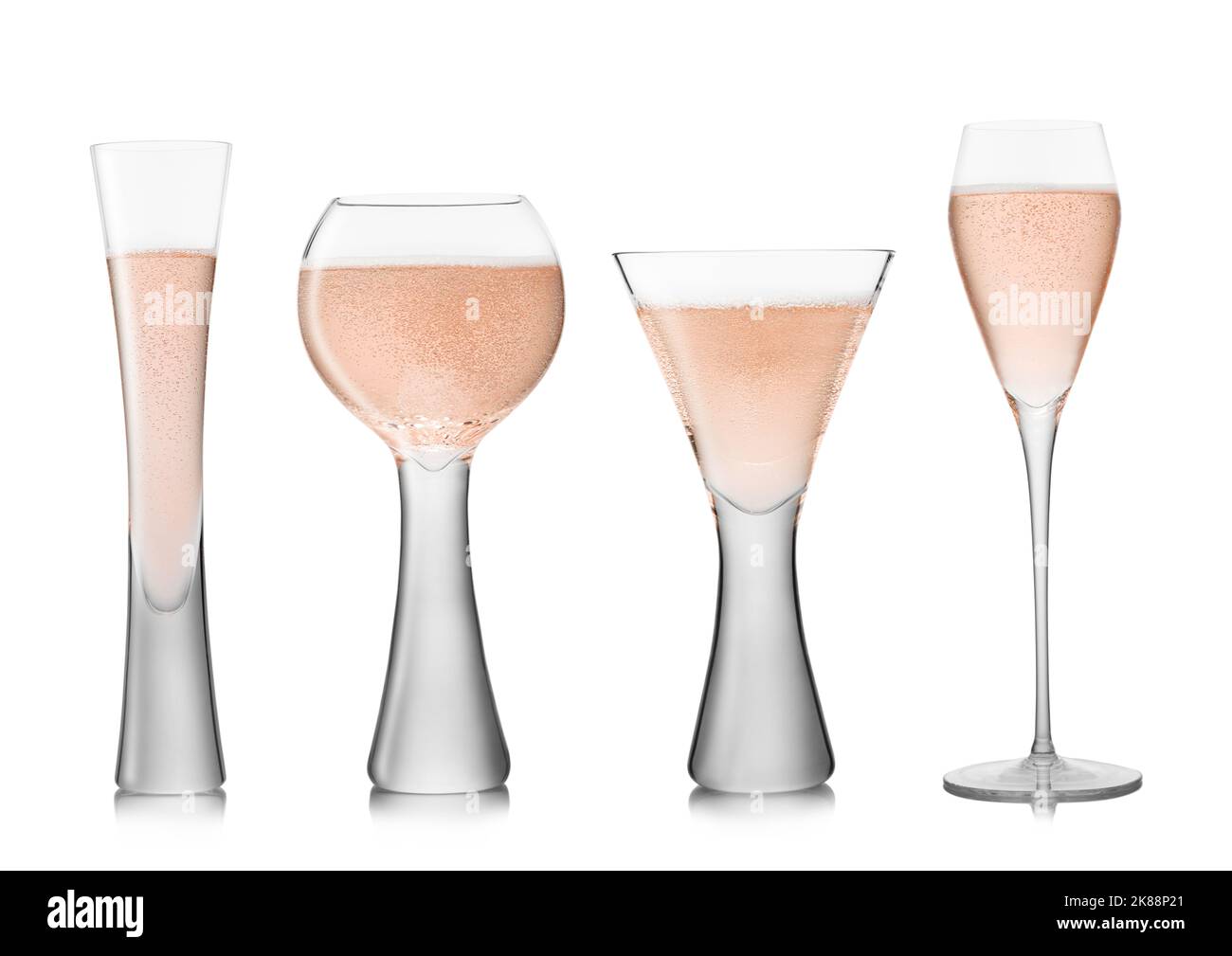 Set of various pink rose champagne and wine glasses on white background ...